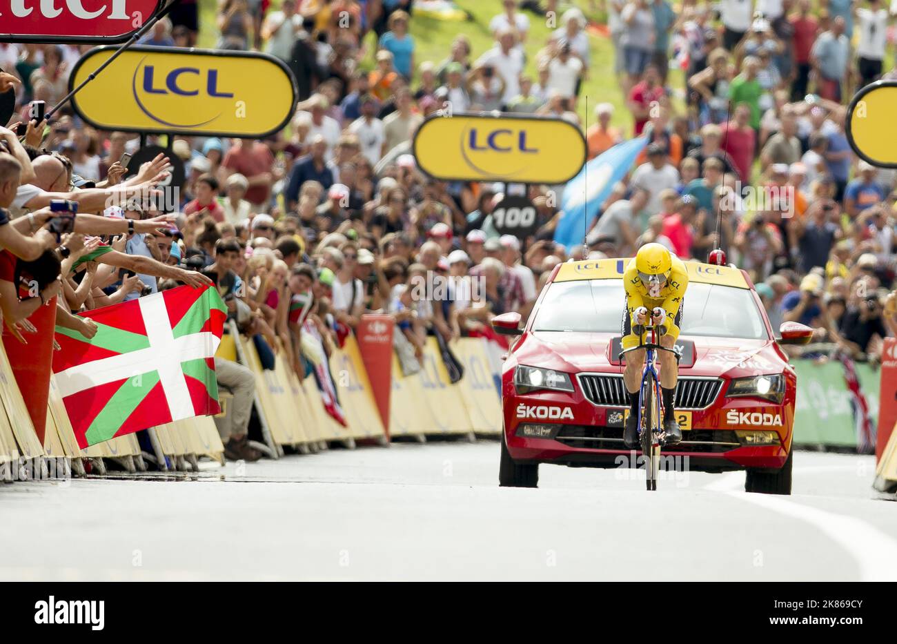 Great Britain's Geraint Thomas for team Sky crosses the finish line ...