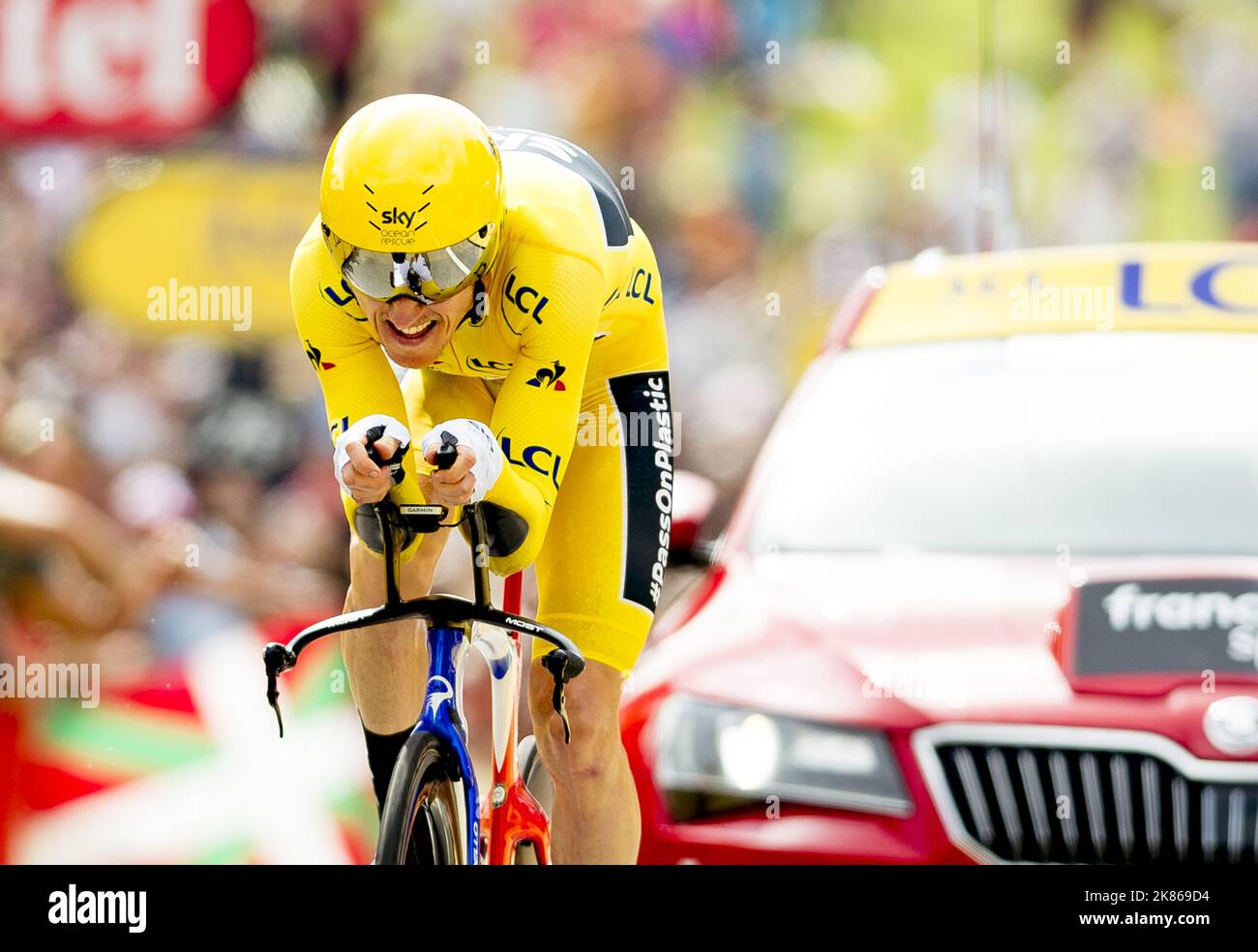 Great Britain's Geraint Thomas for team Sky crosses the finish line ...