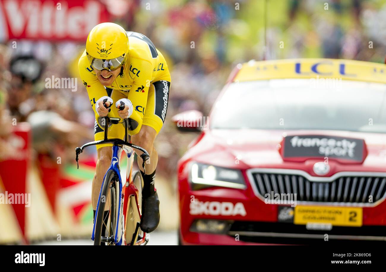 Great Britain's Geraint Thomas for team Sky crosses the finish line ...