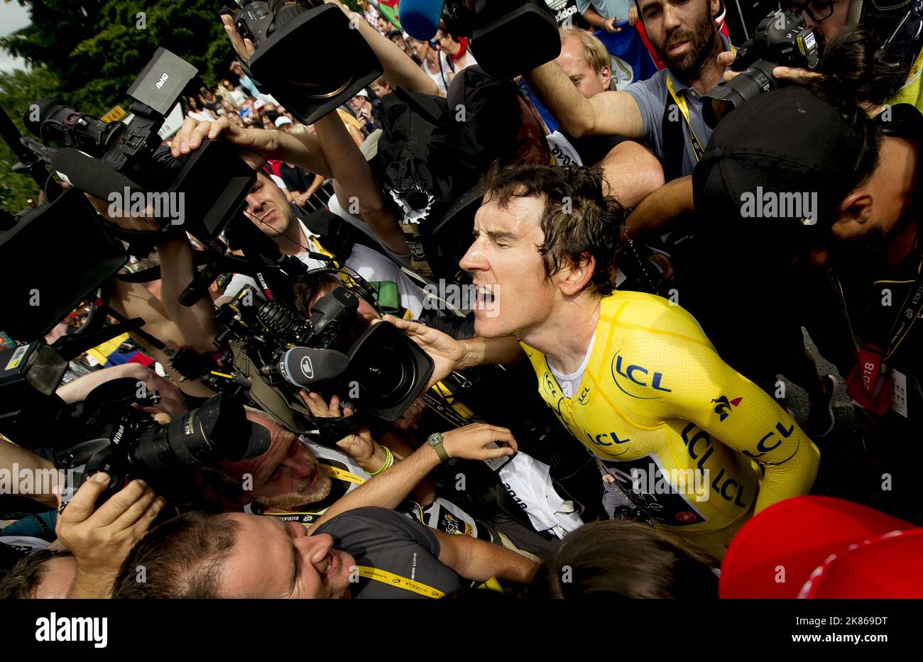 Great Britain's Geraint Thomas for team Sky crosses the finish line ...