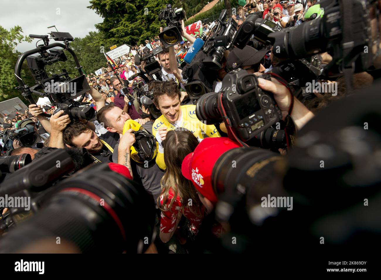Great Britain's Geraint Thomas for team Sky crosses the finish line ...