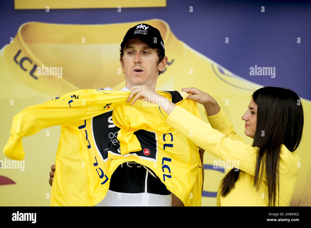 Great Britain's Geraint Thomas for team Sky crosses the finish line ...