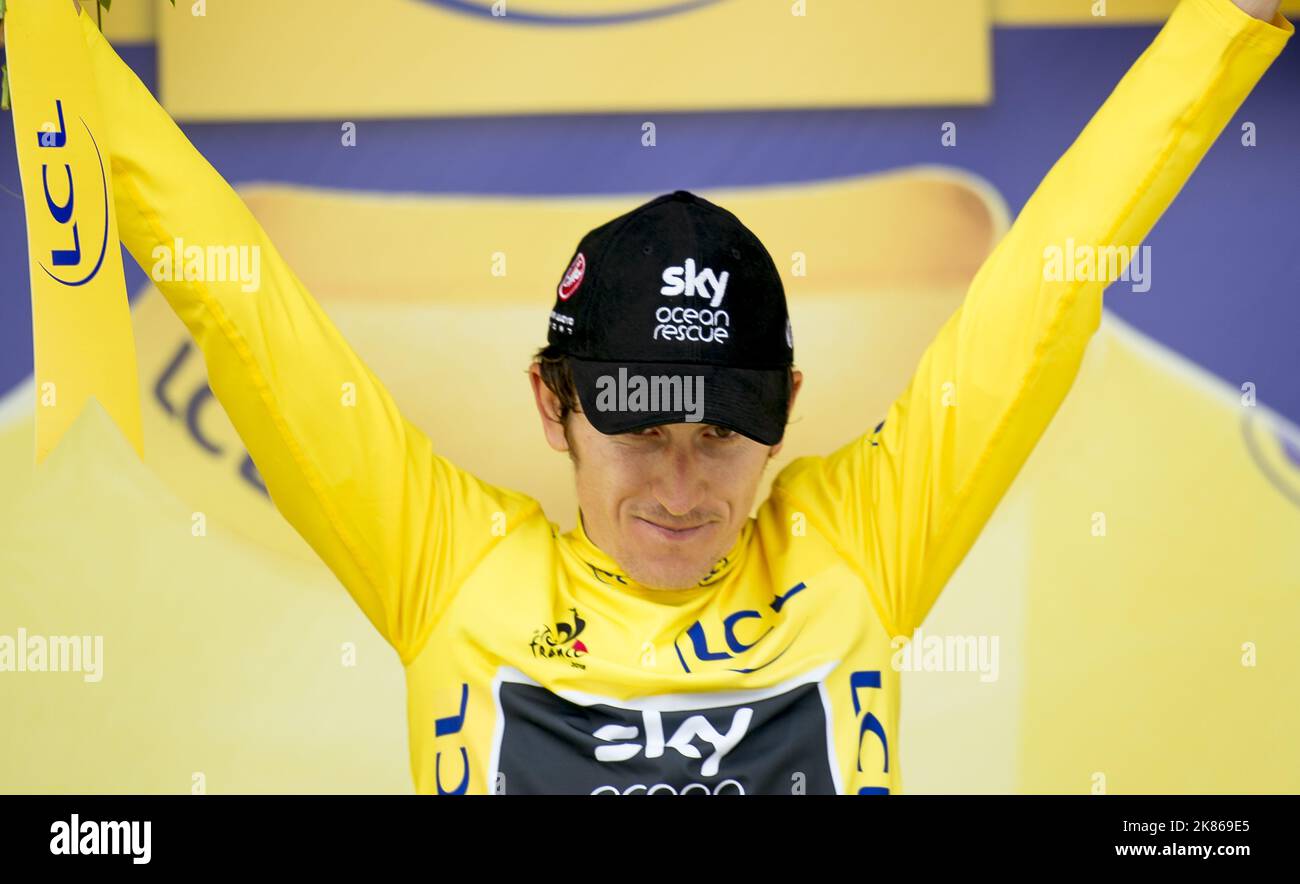 Great Britain's Geraint Thomas for team Sky crosses the finish line ...