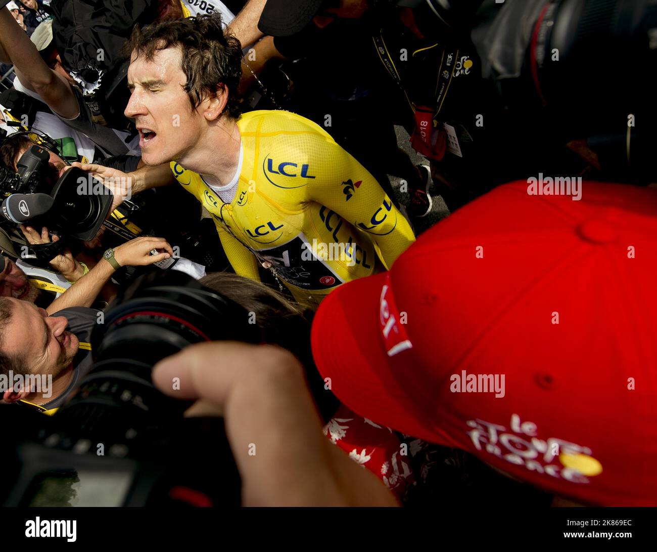 Great Britain's Geraint Thomas for team Sky crosses the finish line ...