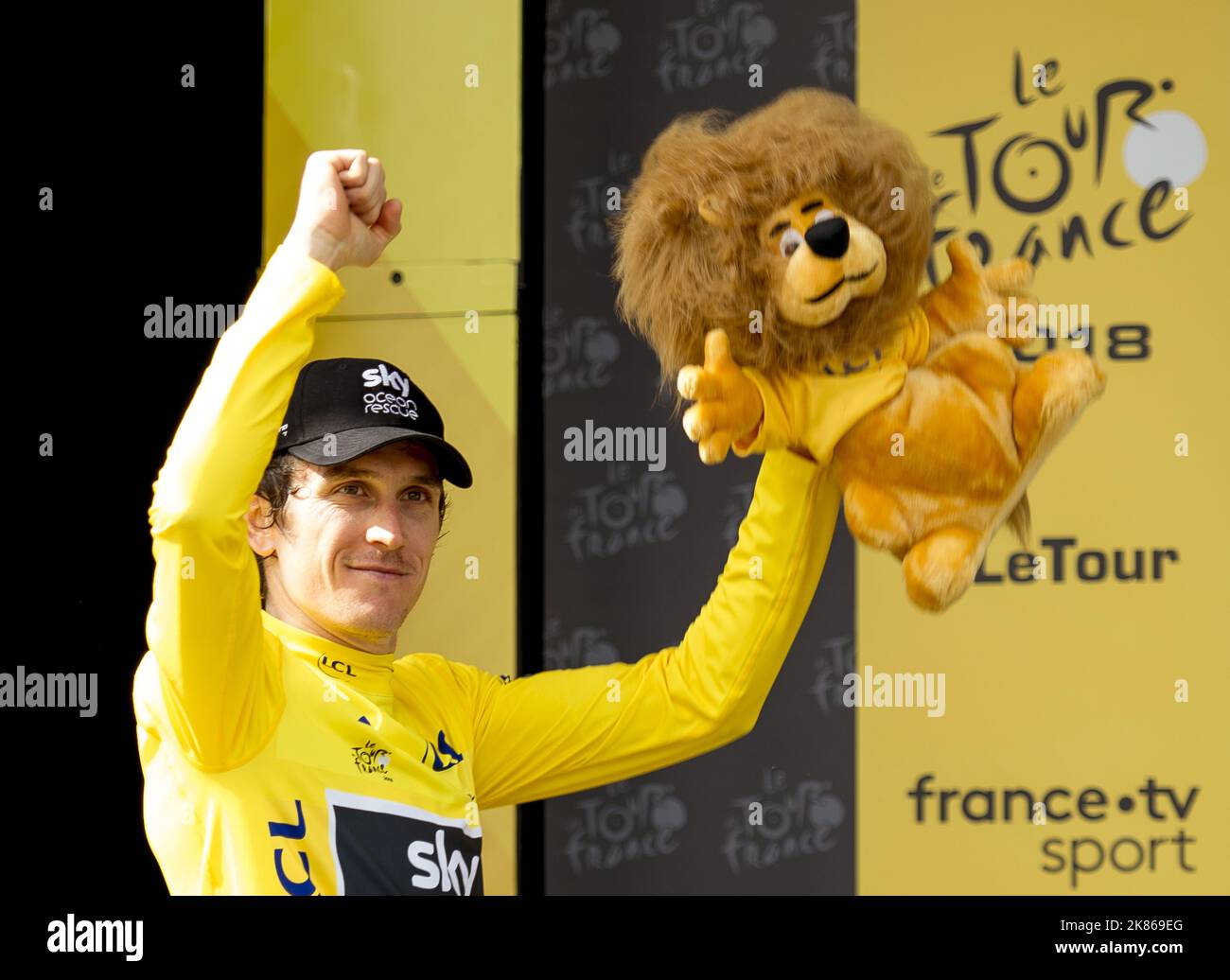 Great Britain's Geraint Thomas for team Sky crosses the finish line ...