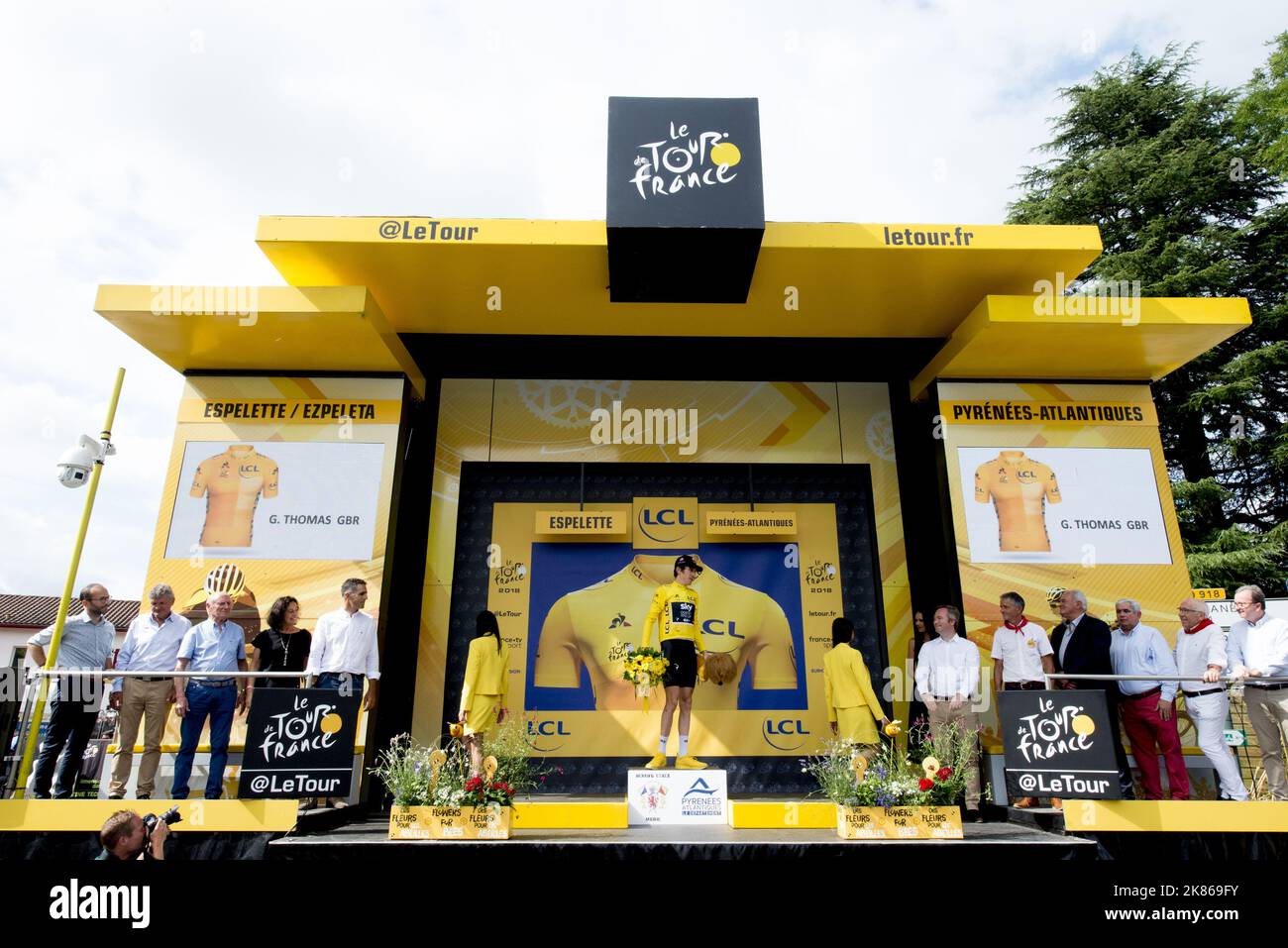 Great Britain's Geraint Thomas on the podium retaining his overall lead ...