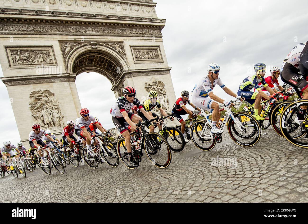 Dan Martin and stage winner Alexander Kristoff around the Arc de ...