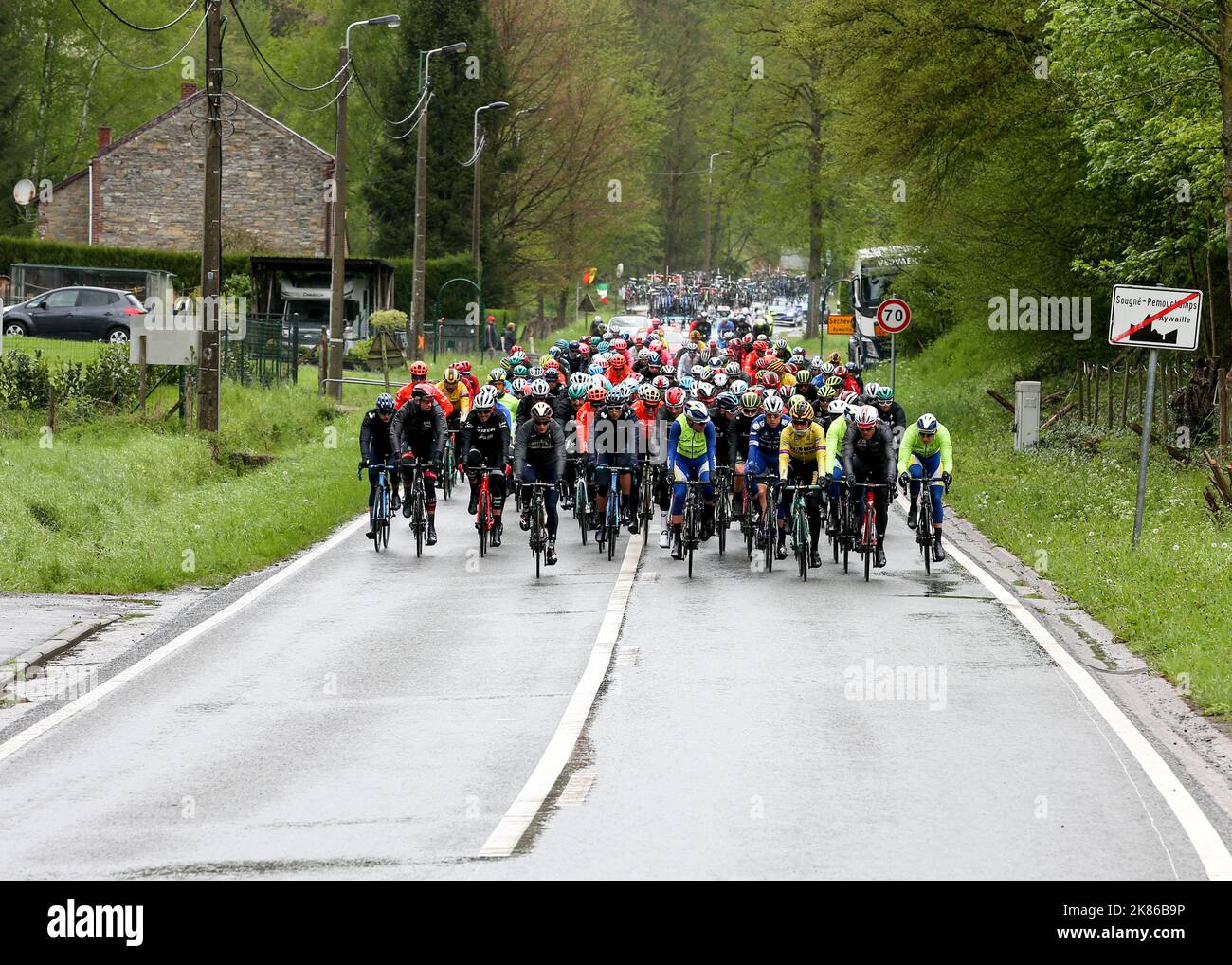 Riders head down into the Remouchamps valley as cross over the return ...