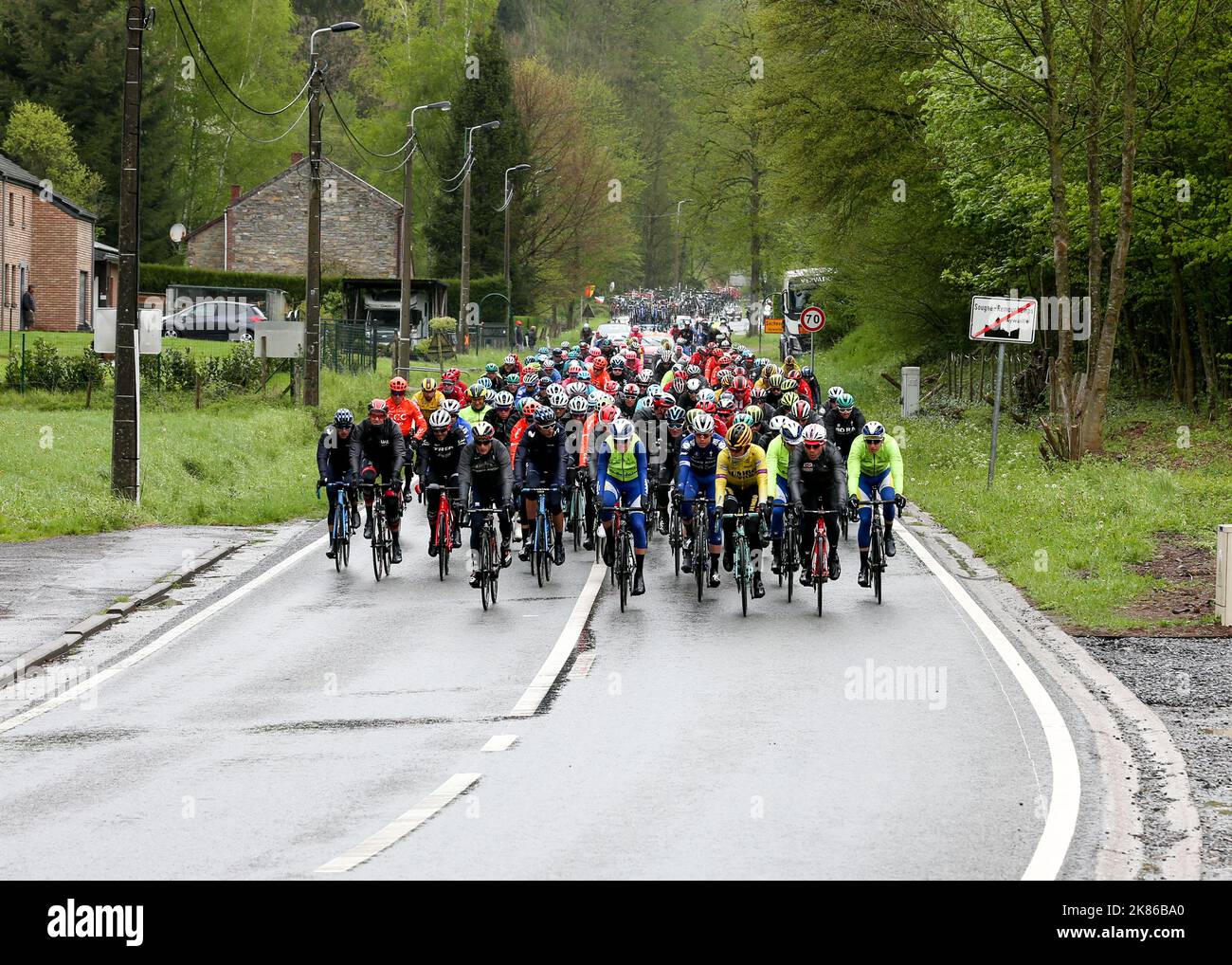 Riders head down into the Remouchamps valley as cross over the return ...