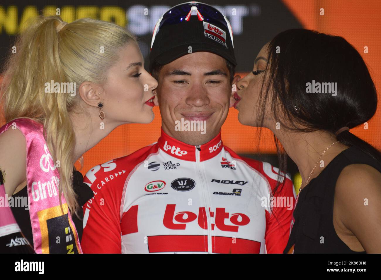 Caleb Evan celebrates on stage after winning stage 8 of the Giro d ...