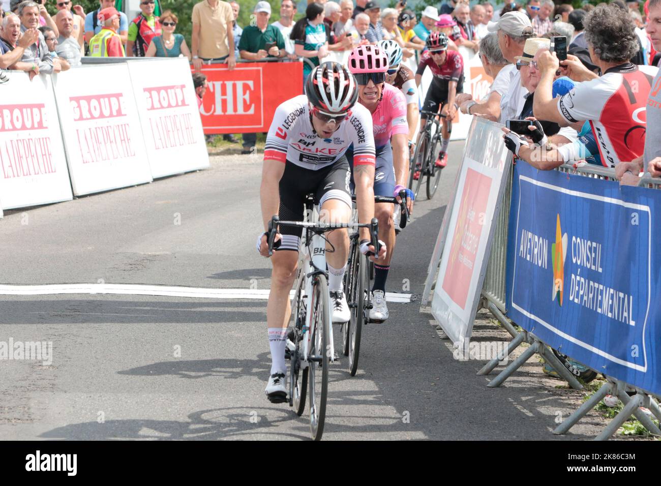 Riders cross the finish line at the end of the Route d'Occitanie 2019 ...