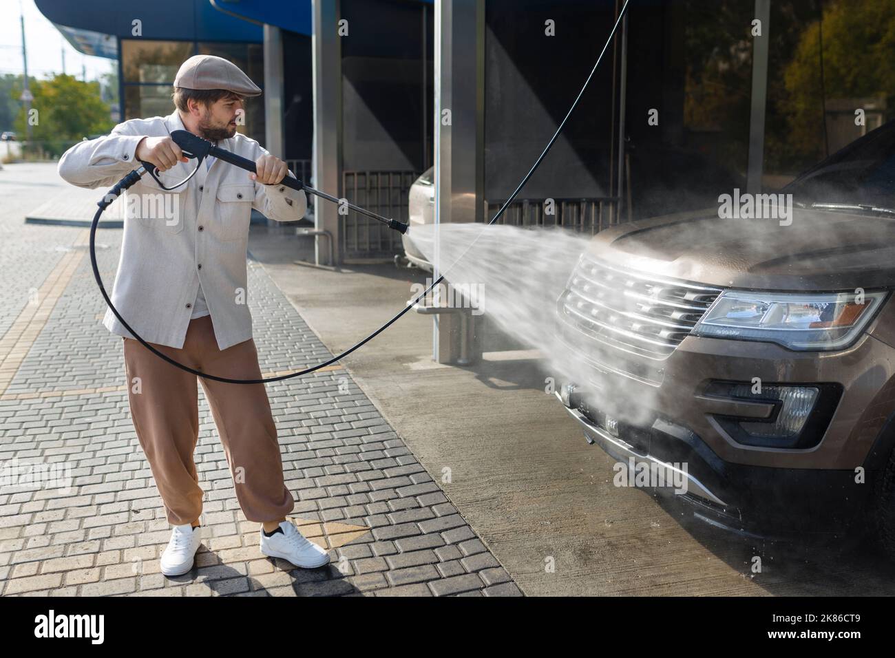 He loves his car. Man washing car Stock Photo - Alamy