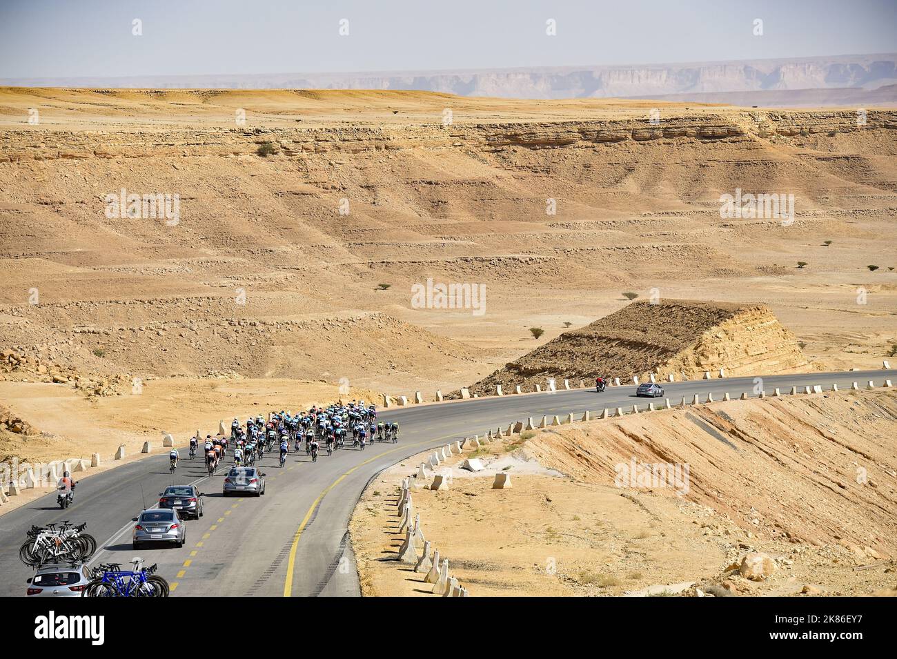 The peloton riding into the desert in the Saudi Tour 2020, stage 1 ...