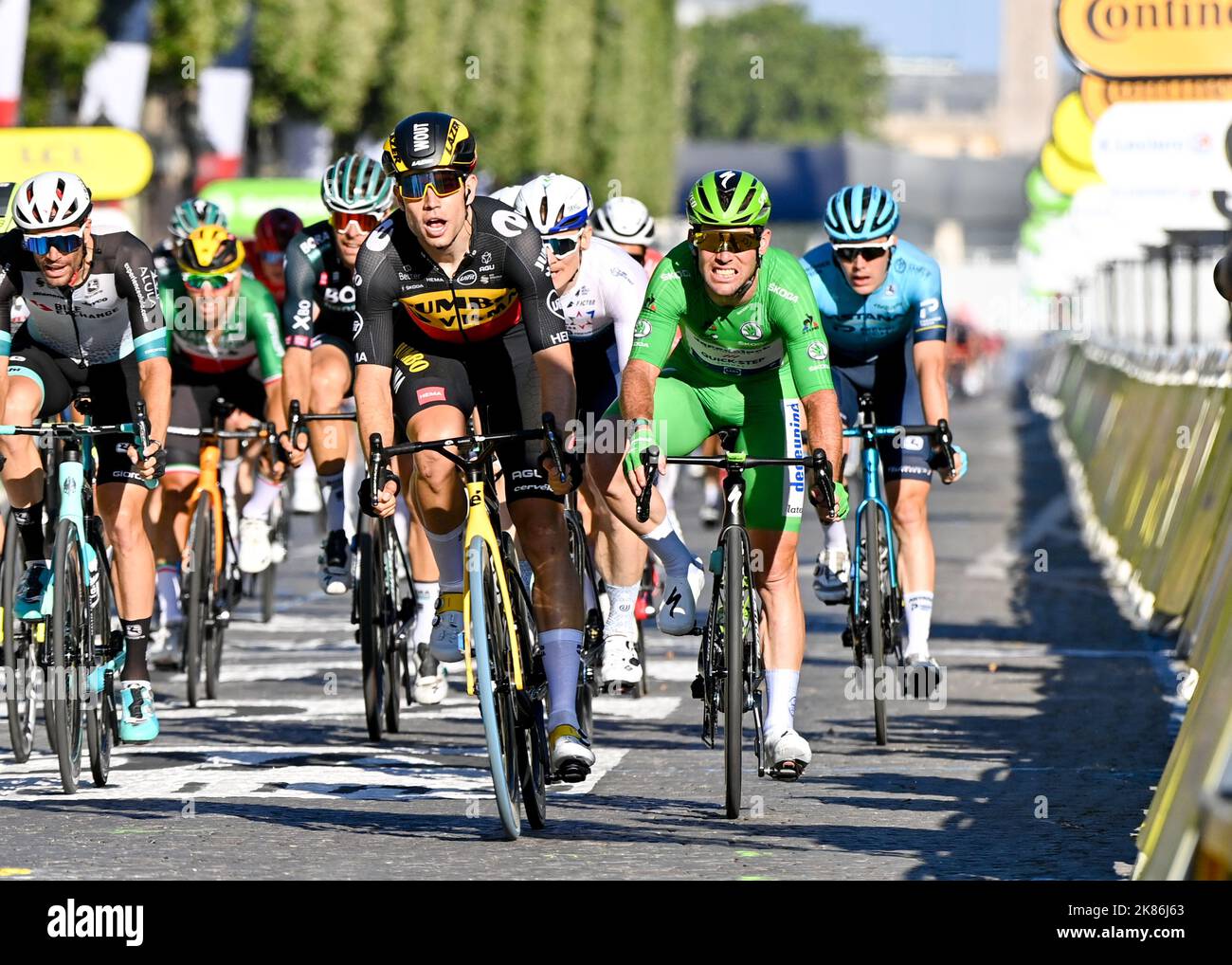 Jumbo Visma Rider Wout van Aert taking the win ahead of green jersey ...