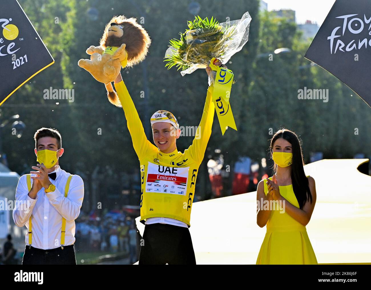 UAE Emirates rider Tadej POGACAR on the the podium in the yellow jersey ...