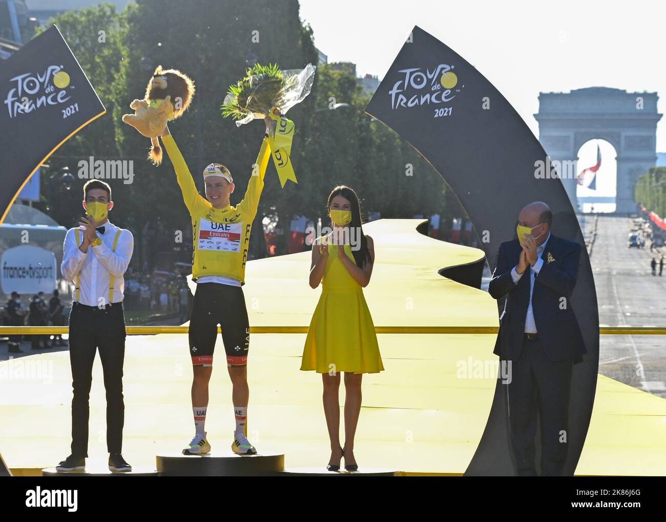 UAE Emirates rider Tadej POGACAR on the the podium in the yellow jersey ...