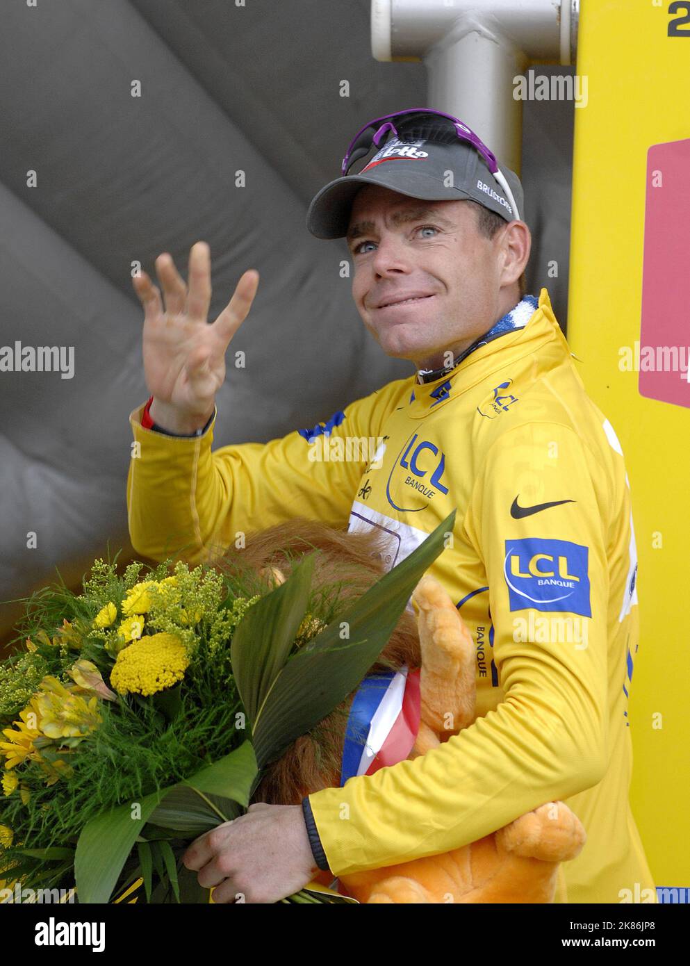 Cadel Evans celebrates on the podium Stock Photo - Alamy