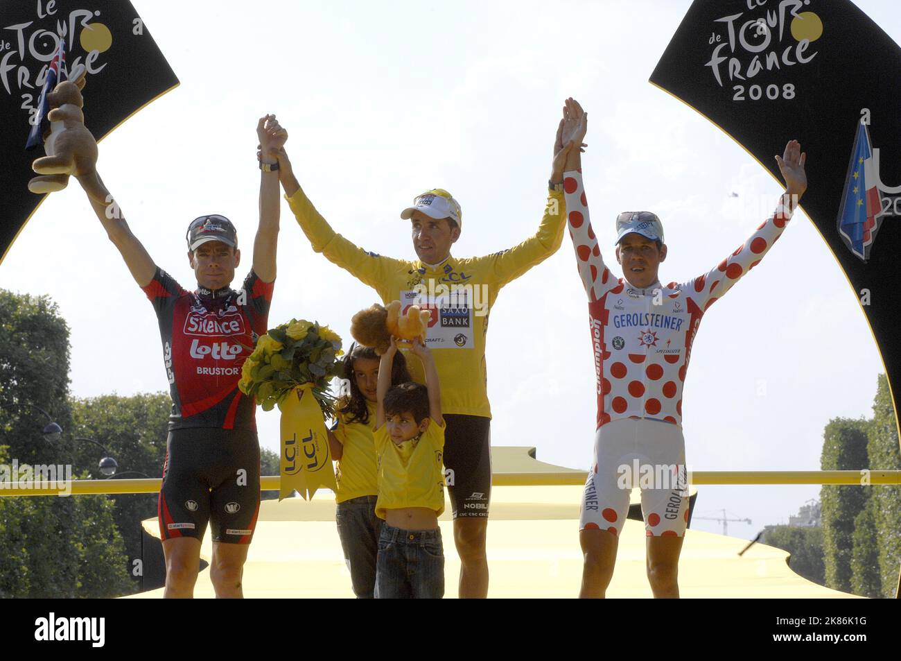 Carlos Sastre, Bernhard Kohl and Cadel Evans celebrate on the podium at ...