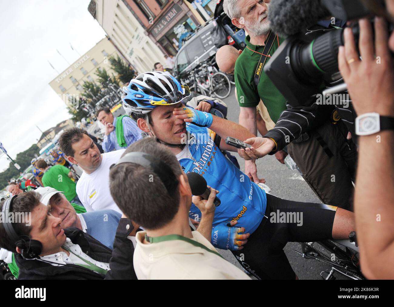 Mark Cavendish exhausted after crossing the finish line Stock Photo - Alamy