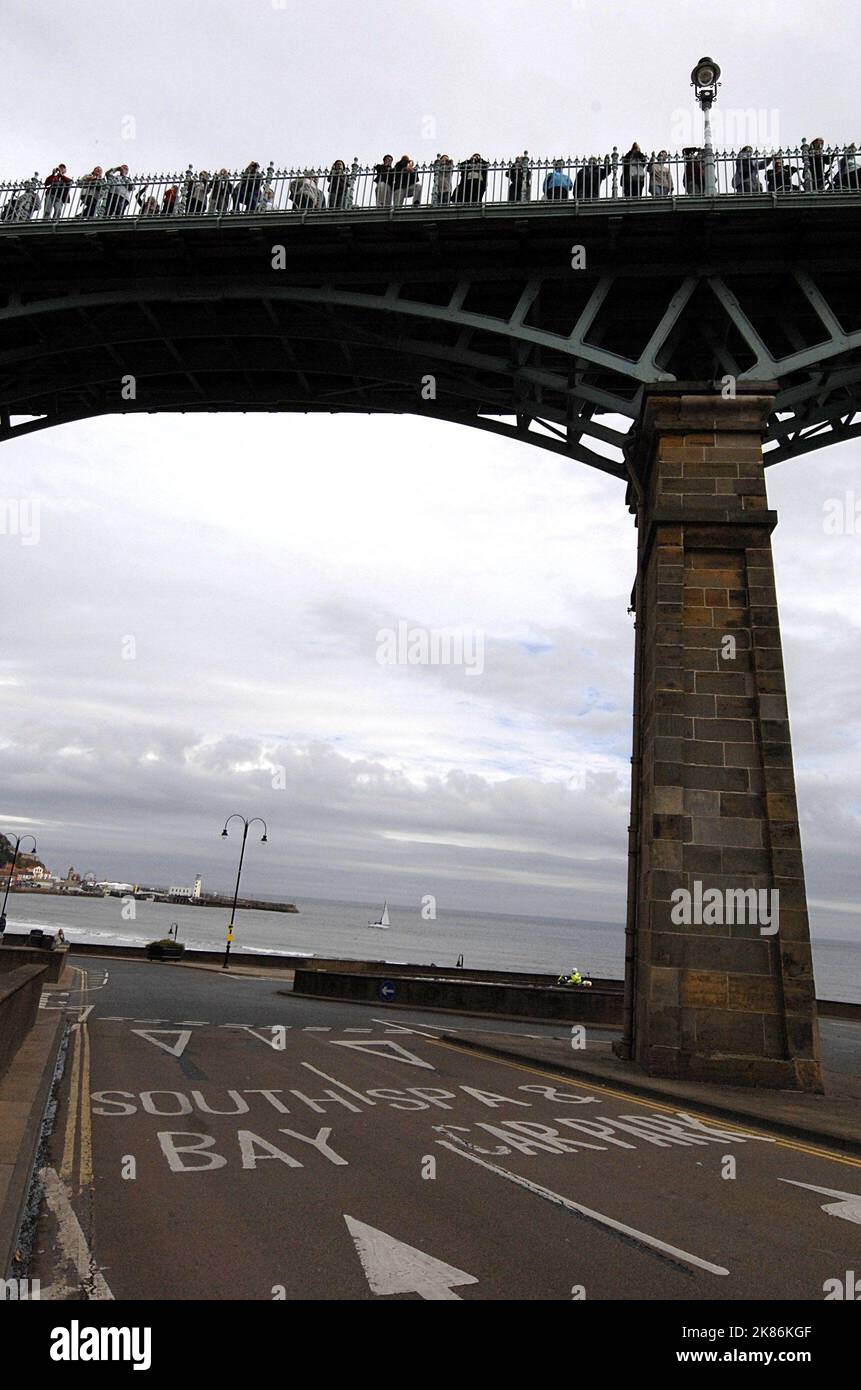 Crowds gather on the bridge to watch the action during Stage Five of ...