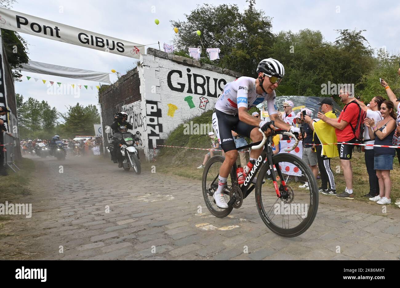 Tadej Pogacar for team UAE Emirates ride the cobbles of Pont Gibus in ...