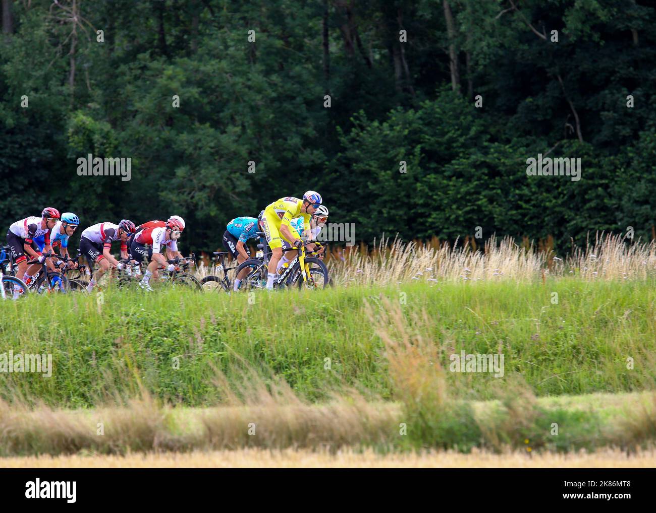 Wout Van Aert launching his stage long attack during Tour De France ...