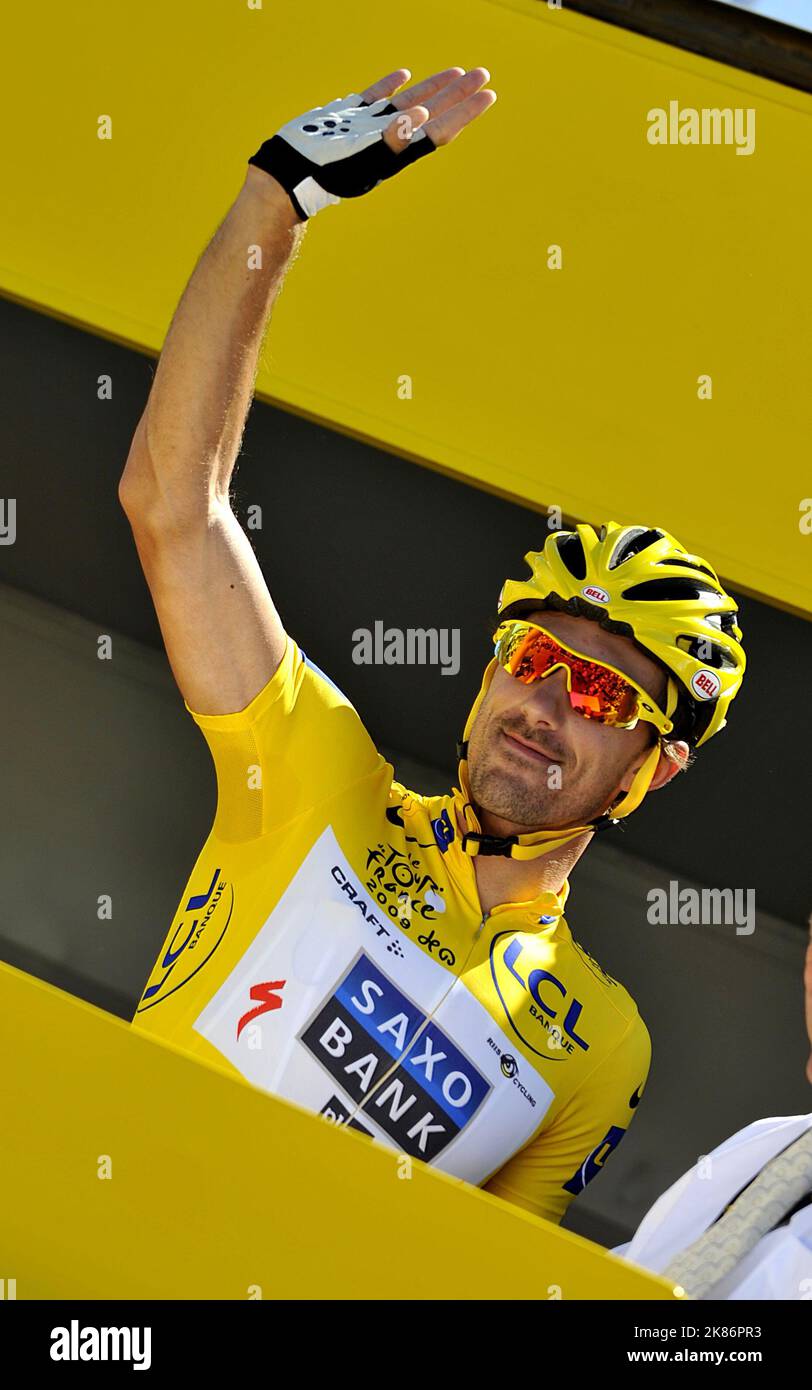 Team Saxo Bank's Fabian Cancellara signs in before the fifth stage of ...