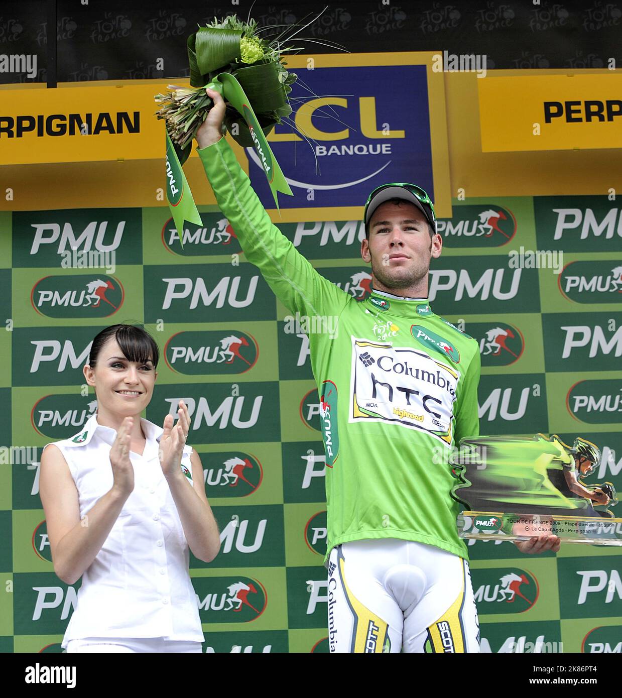 Team Columbia's Mark Cavendish wearing the green jersey on the podium after the fifth stage of ...