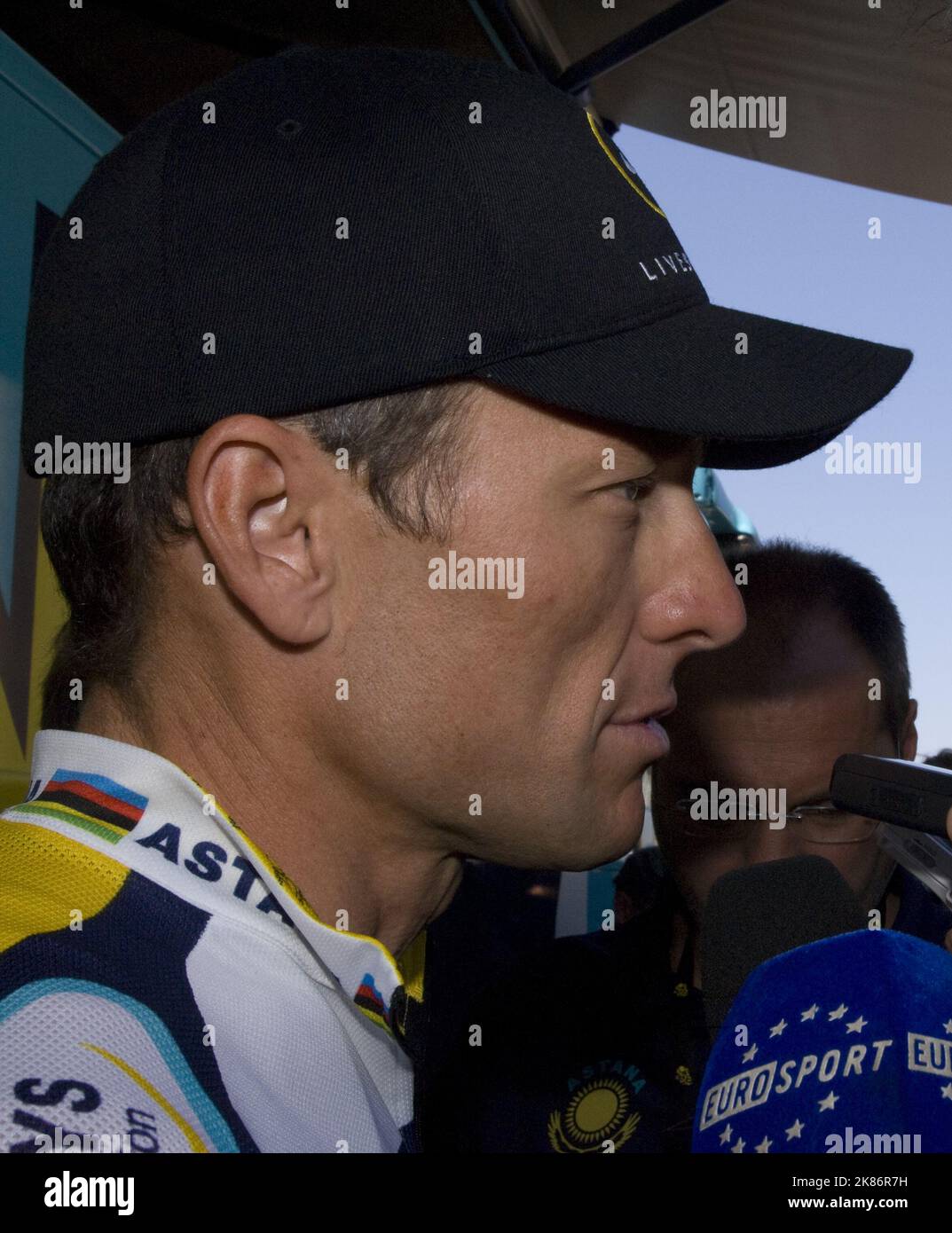 Lance Armstrong is interviewed at the start of stage nine Stock Photo ...