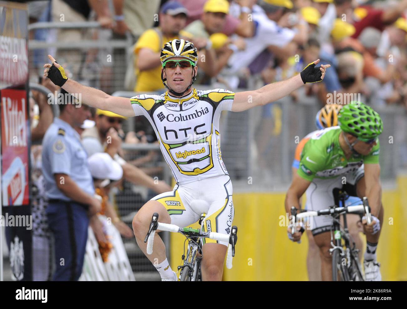 Mark Cavendish riding over the finish line in Issoudun to win the 10th ...