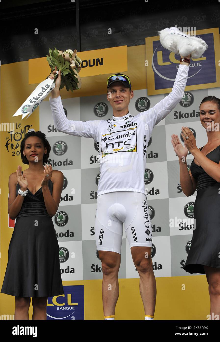 Team Columbia HTC's Tony Martin celebrates with the White Jersey after ...