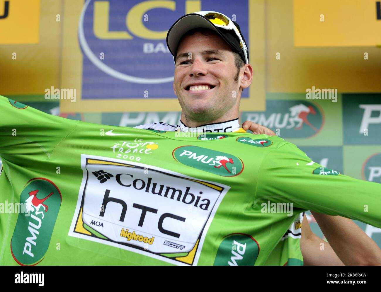 Mark Cavendish claims his green jersey after winning his fourth stage ...