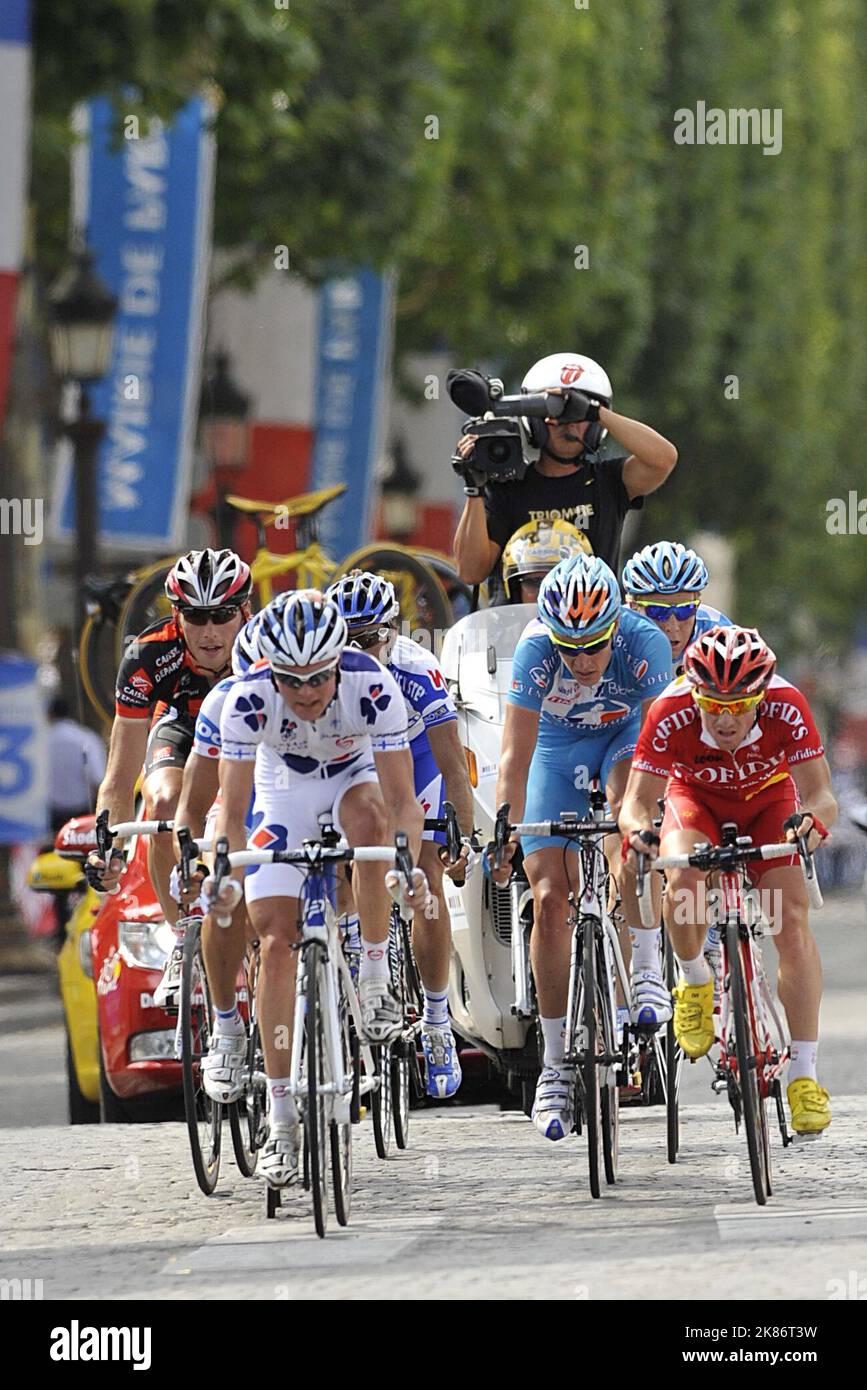 Riders competing in the twenty first and final stage of the Tour de ...