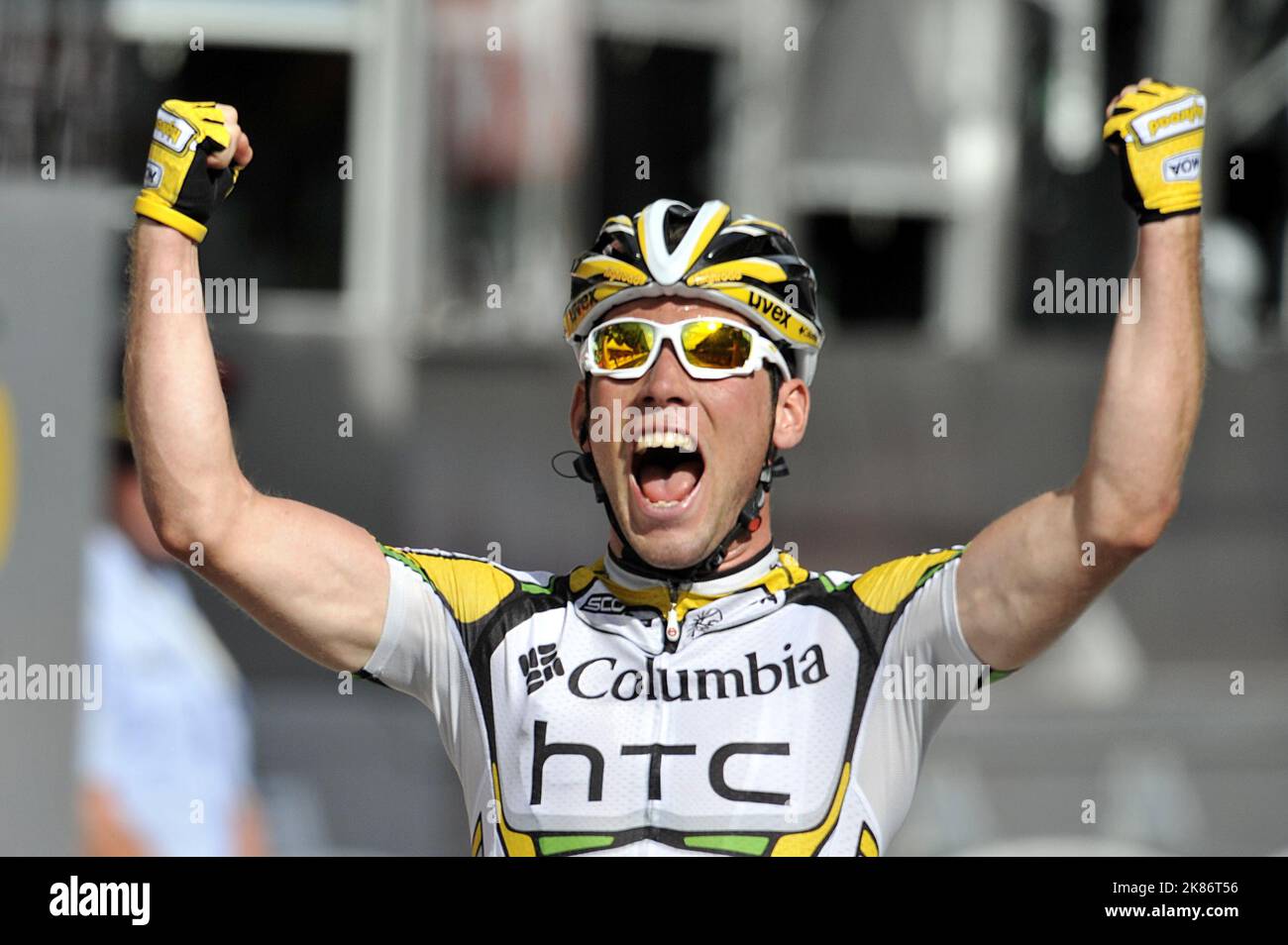 Columbia's Mark Cavendish crosses the line to win the twenty first and ...