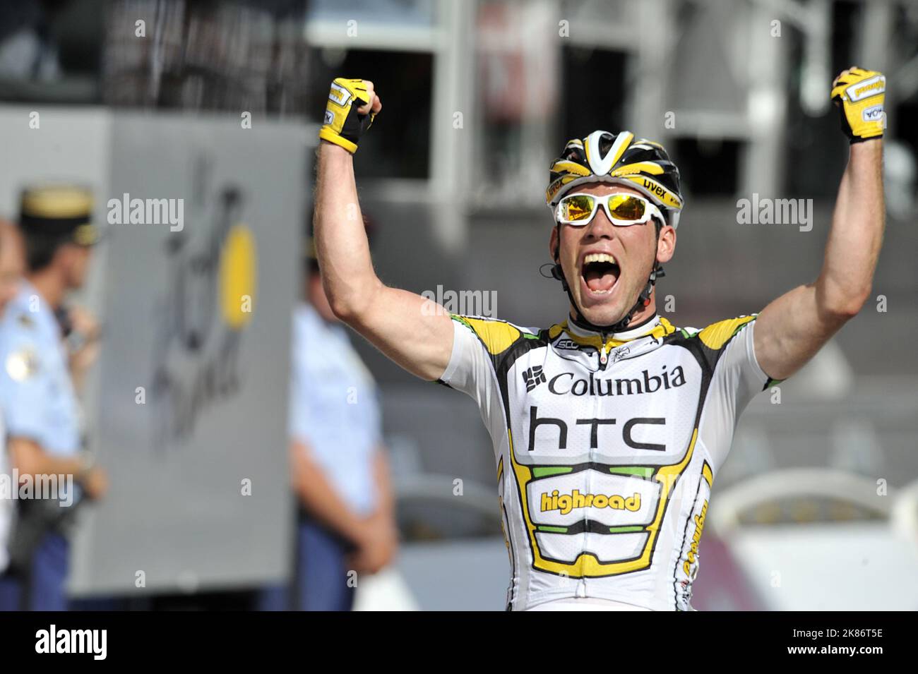 Columbia's Mark Cavendish crosses the line to win the twenty first and ...
