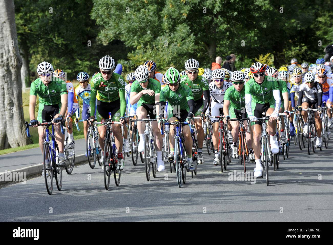 The An Post Sean Kelly Team rolls out of the Ritz -Carlton Hotel on the ...