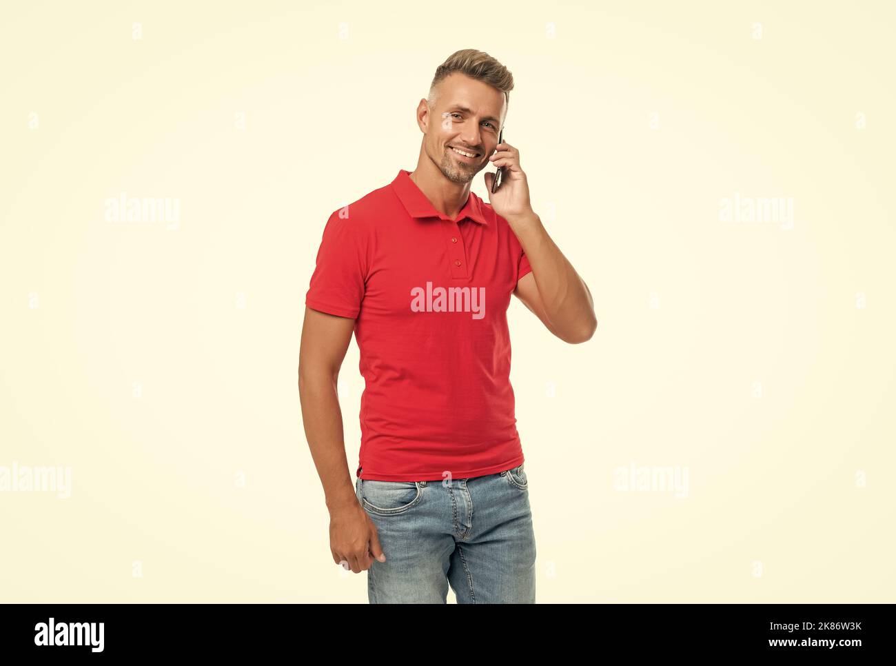 happy man in casual shirt speak on phone isolated on white background ...
