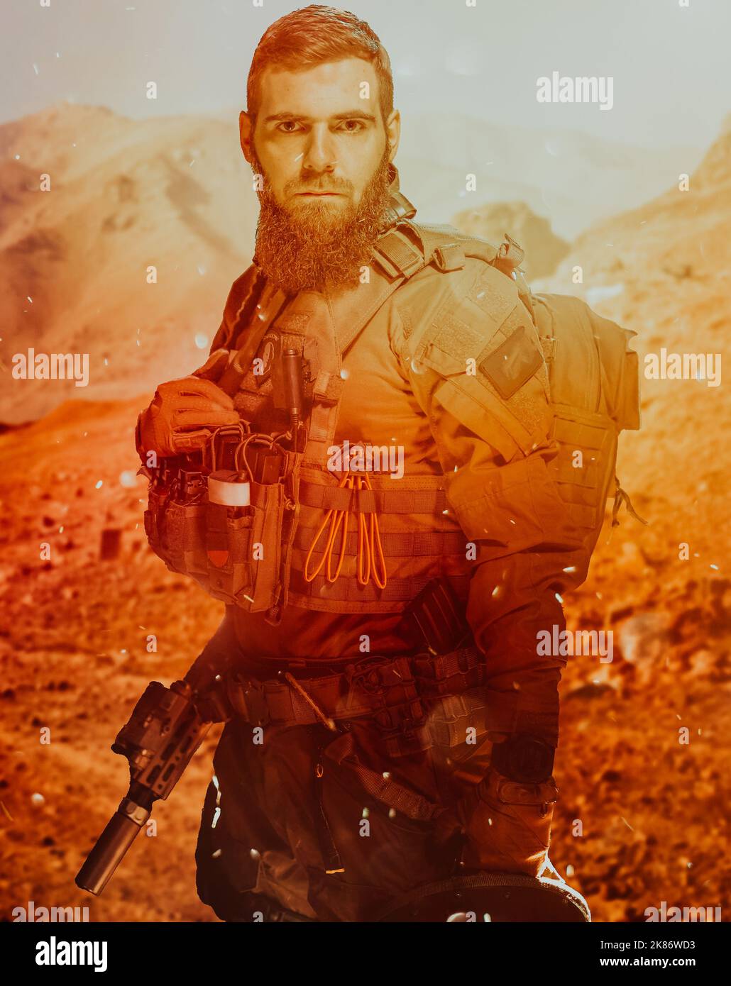 Army soldier in Combat Uniforms with an assault rifle and combat helmet ...