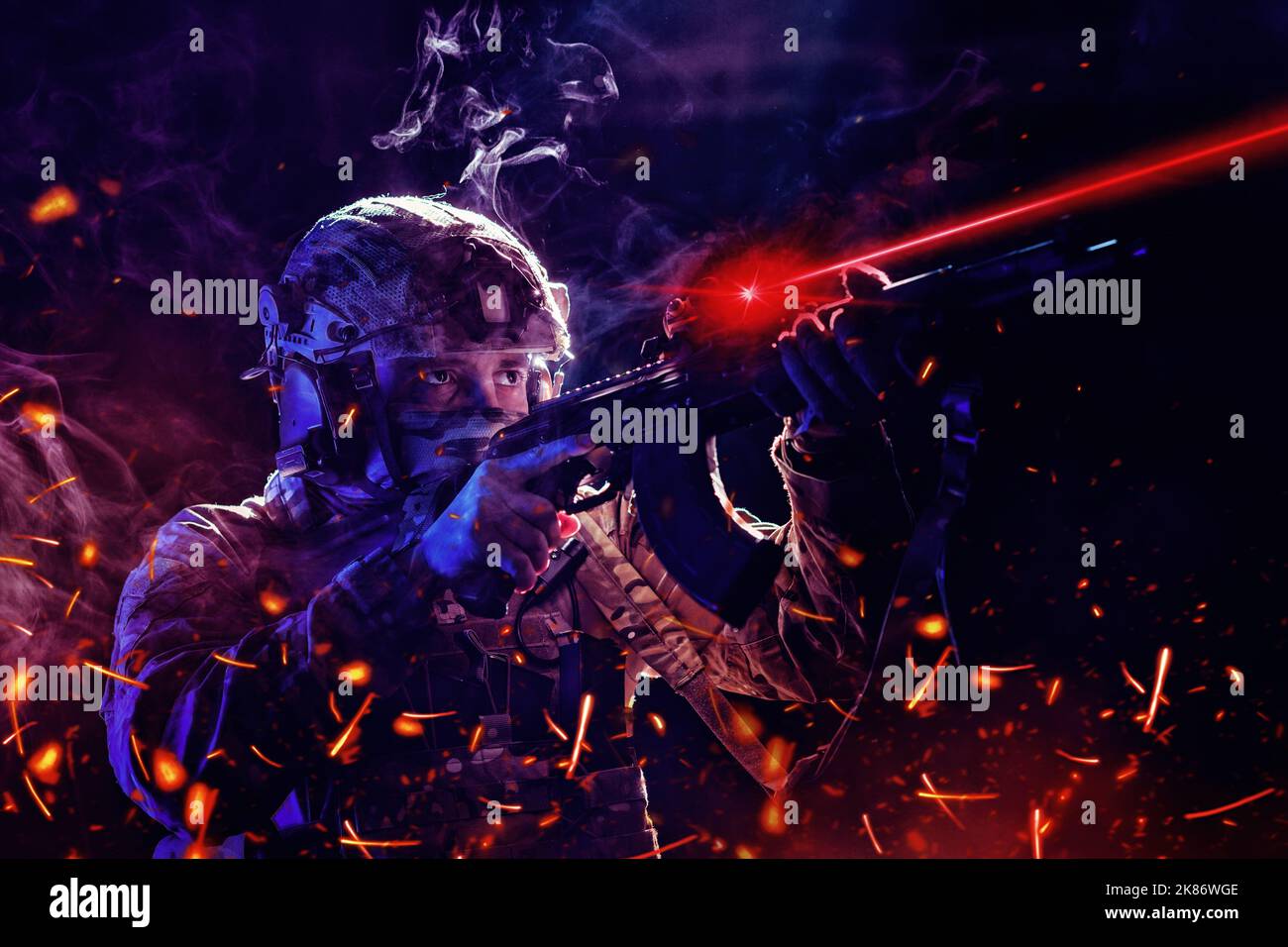 Army soldier in Combat Uniforms with an assault rifle and combat helmet ...
