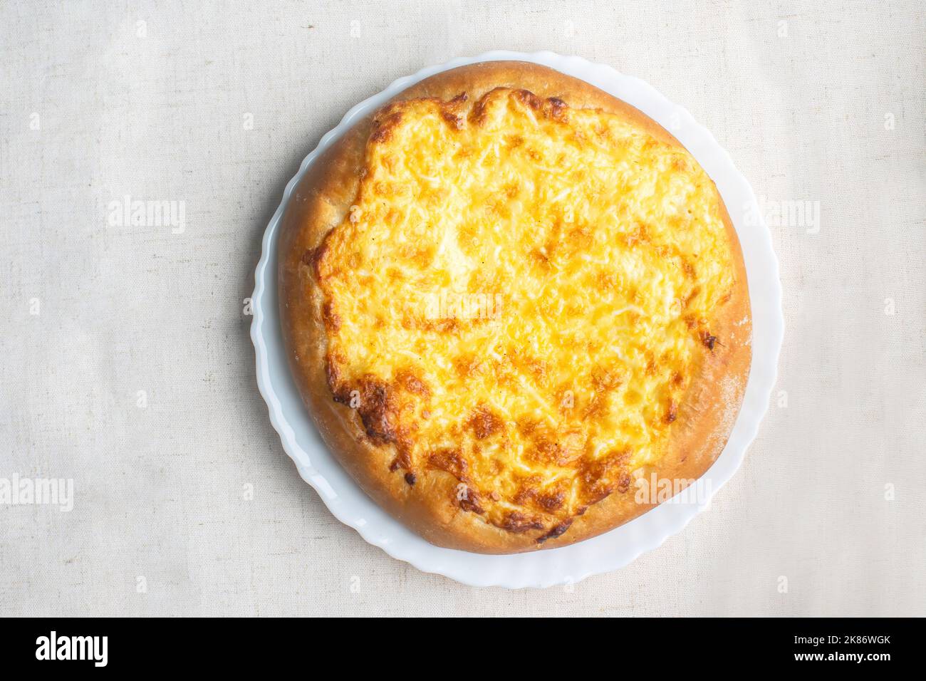 Shanga: traditional Russian pastries with potatoes and eggs. Khachapuri ...