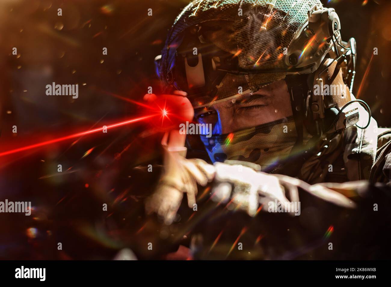 Army soldier in Combat Uniforms with an assault rifle and combat helmet ...