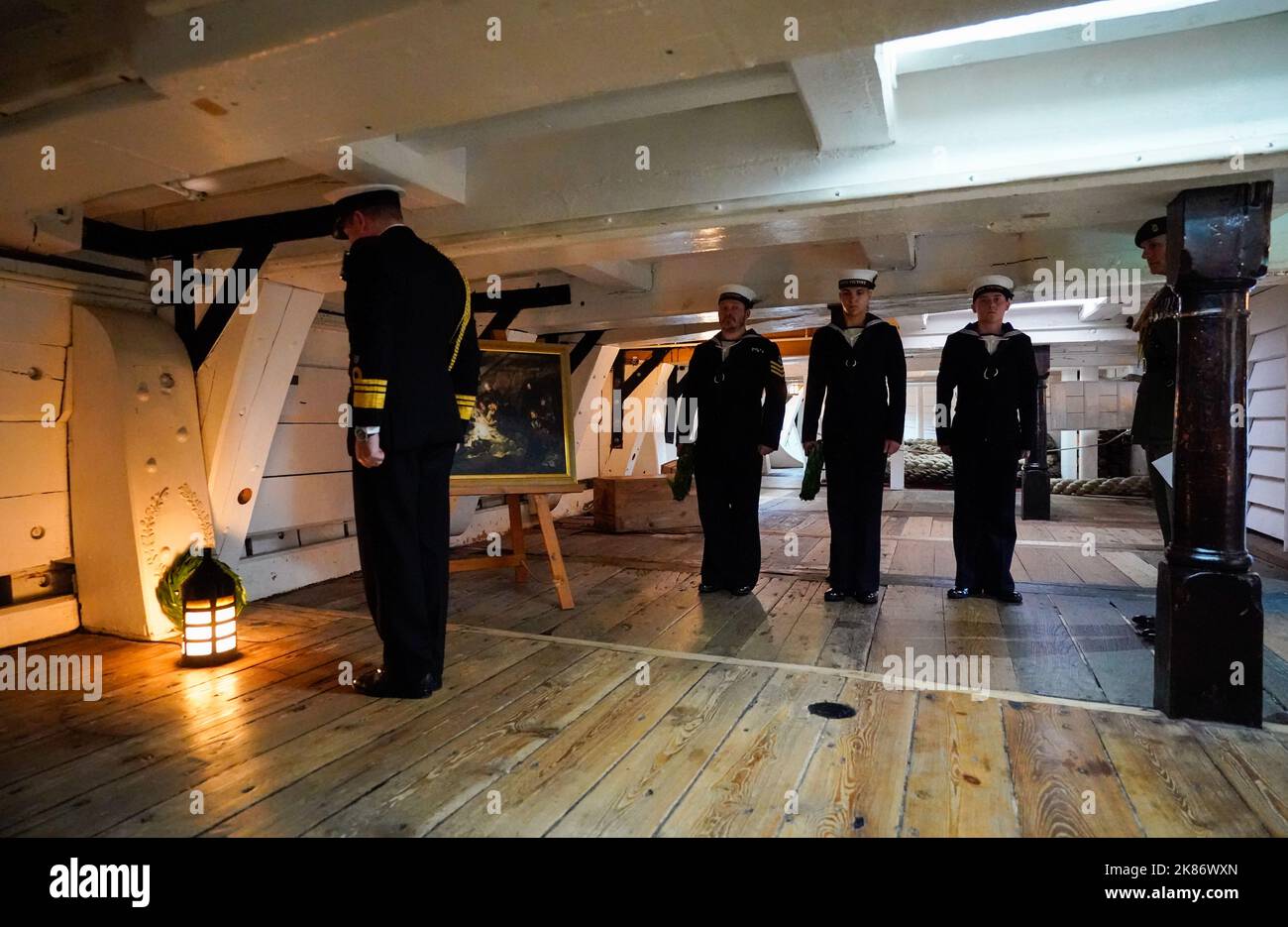 Second Sea Lord Vice-Admiral Martin Connell (left) lays a wreath on the ...