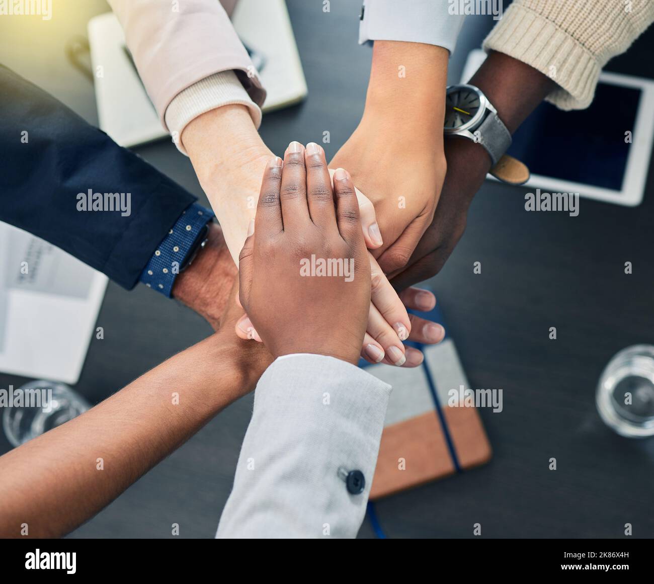 Our team is strongest when we work together. business colleagues with ...