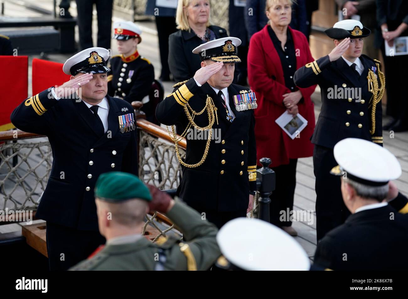 Commanding officer of HMS Victory Lieutenant Commander BJ Smith (left ...