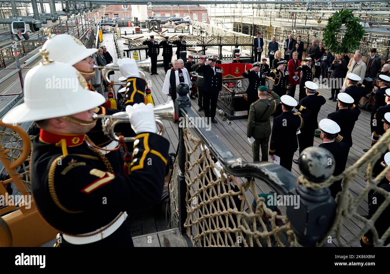 The Last Post is played as Royal Navy personnel and guests on board HMS ...