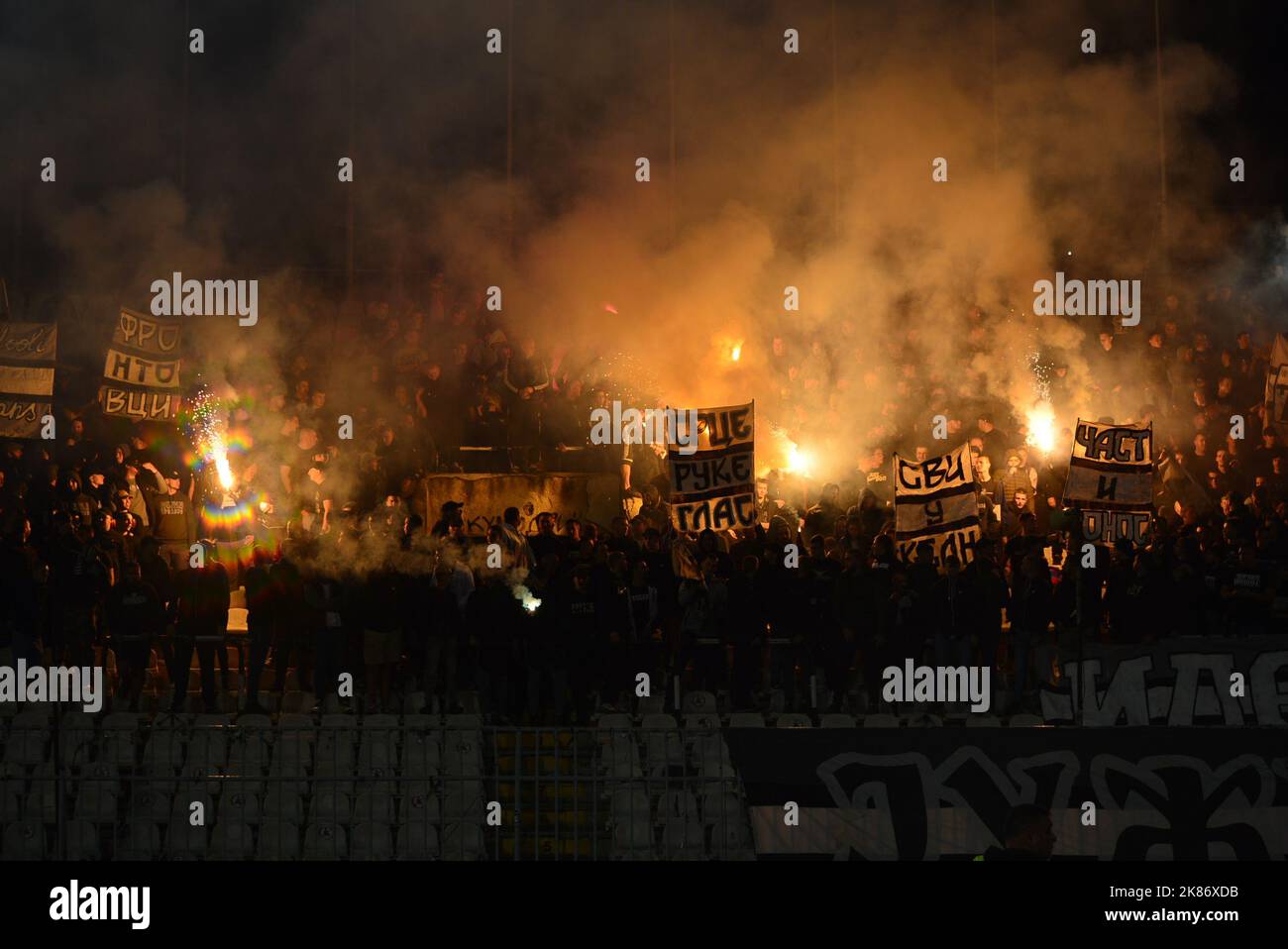 The Partizan fans with banners and signs on a football game against ...
