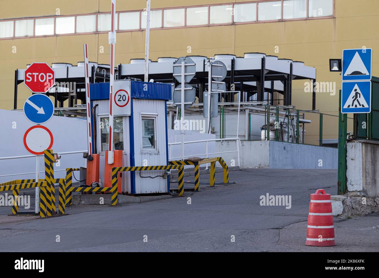 checkpoint for incoming vehicles equipped with a barrier. car ...