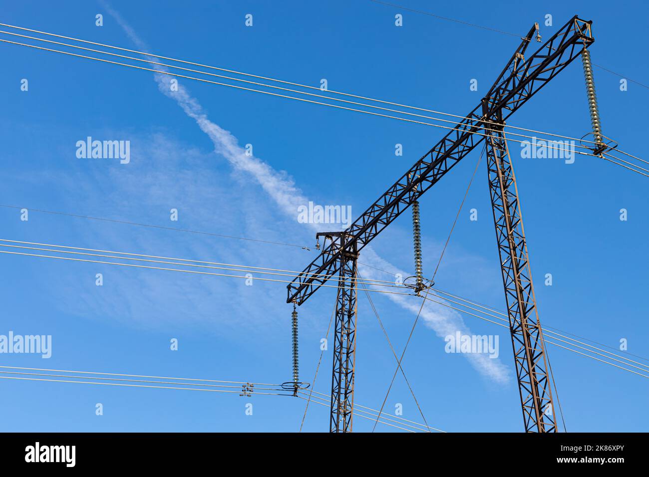 power line mast against the blue sky. power line Stock Photo - Alamy