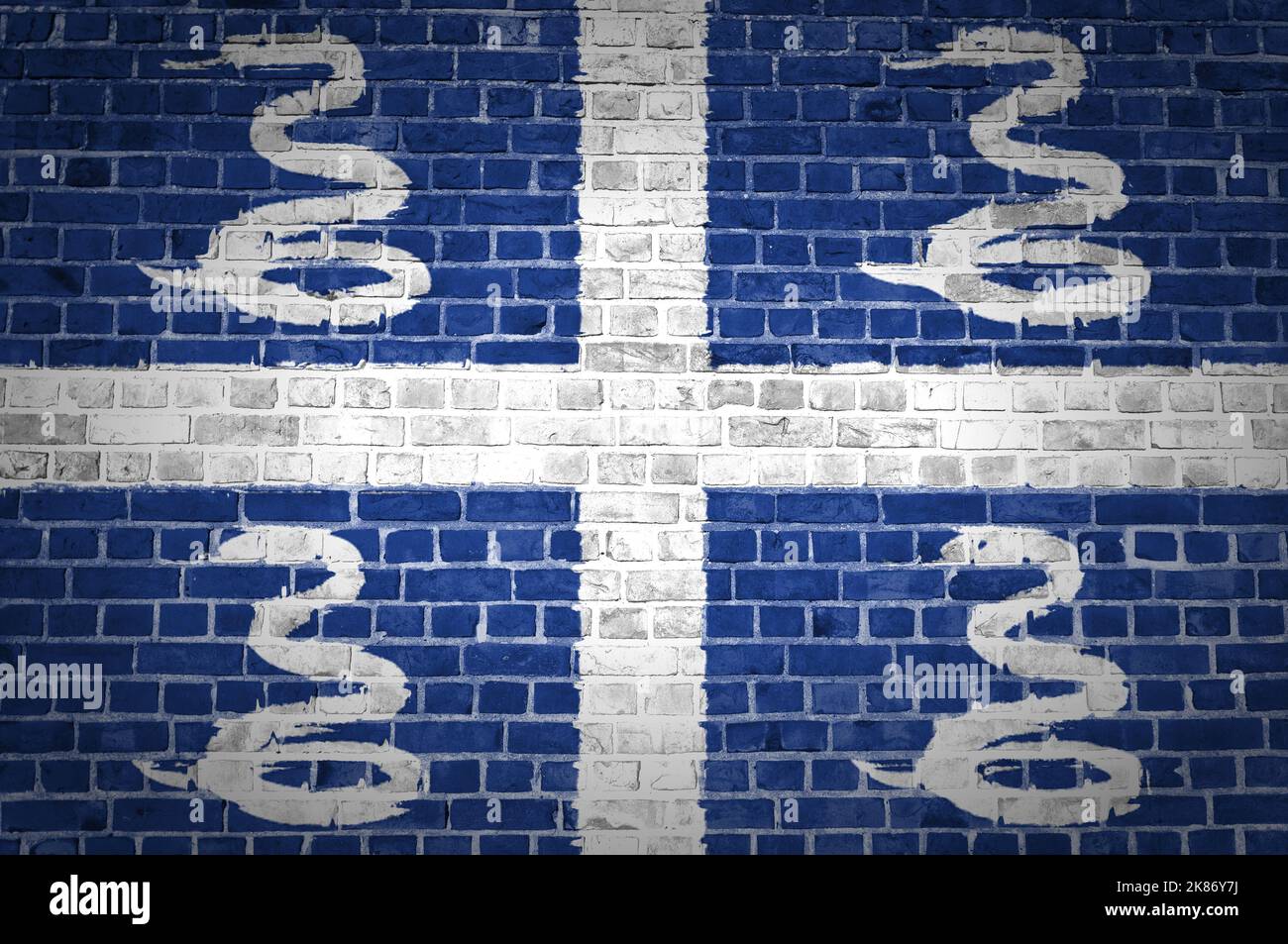 An image of the Martinique flag painted on a brick wall in an urban ...
