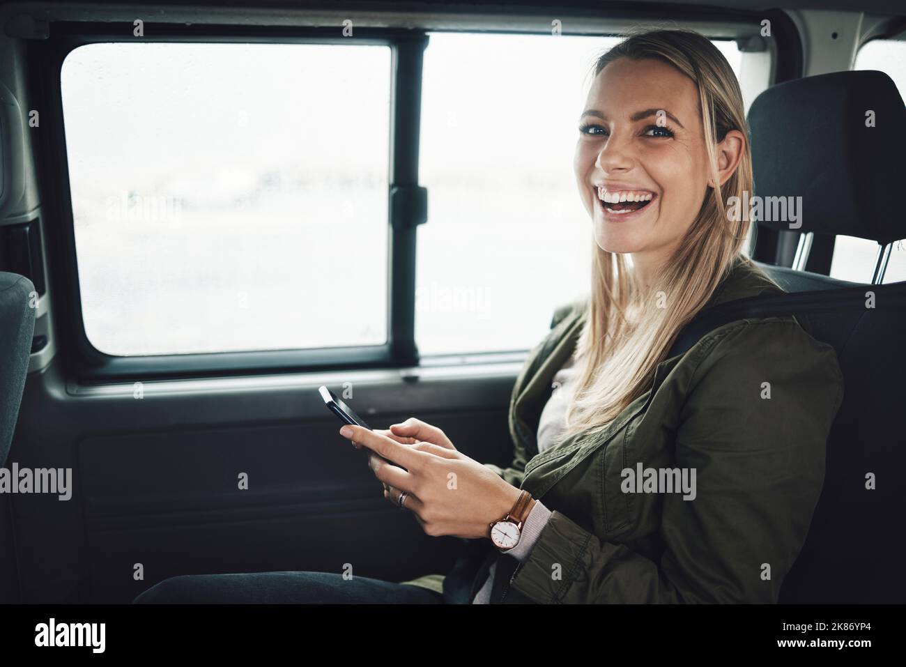 Woman, road trip and phone for location, gps and map of summer vacation ...